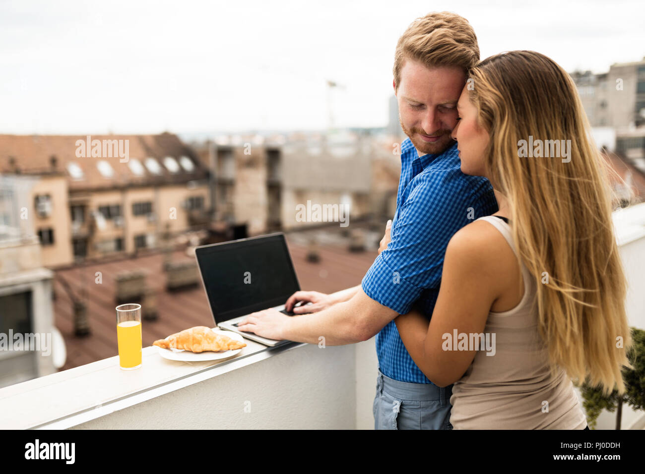 Beautiful couple in love hugging Stock Photo - Alamy