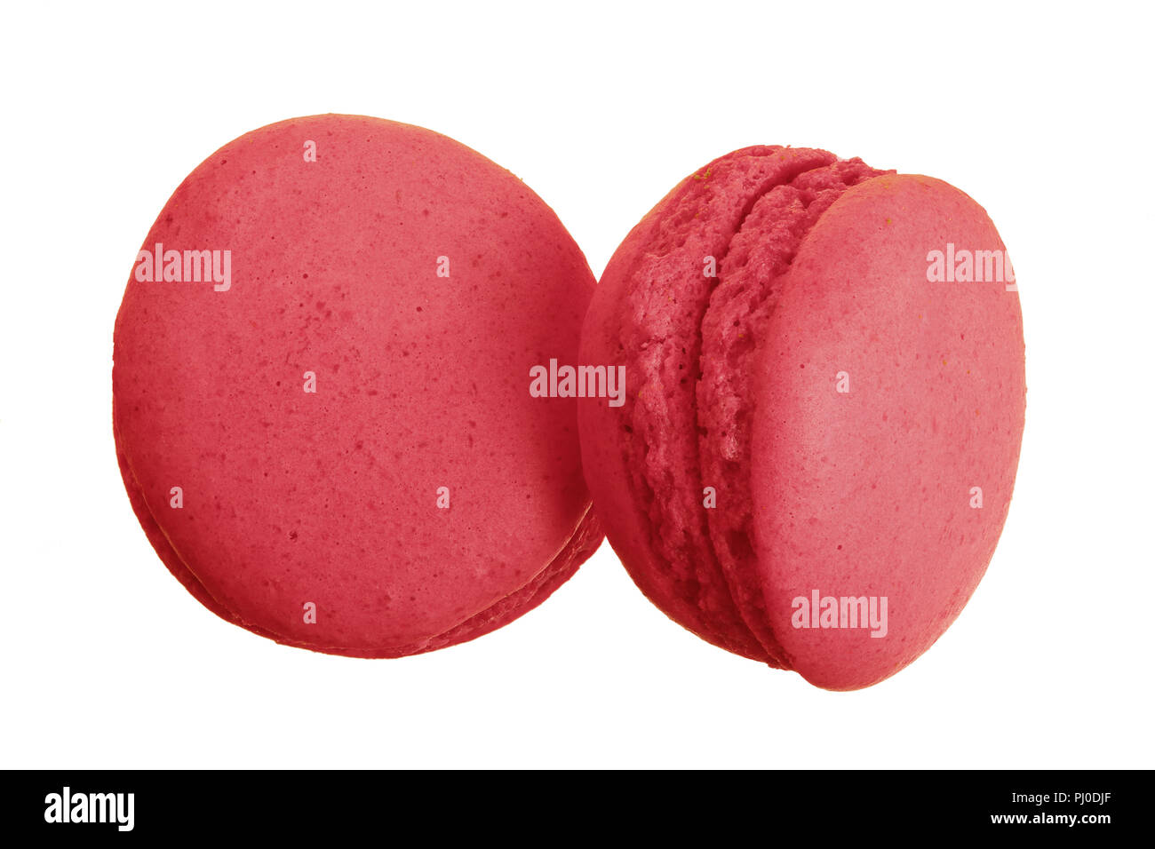 red macaroon isolated on white background without a shadow closeup. Top ...