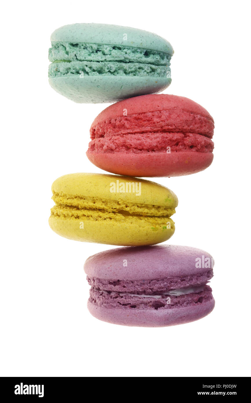 colored macaroons isolated on white background without a shadow closeup ...