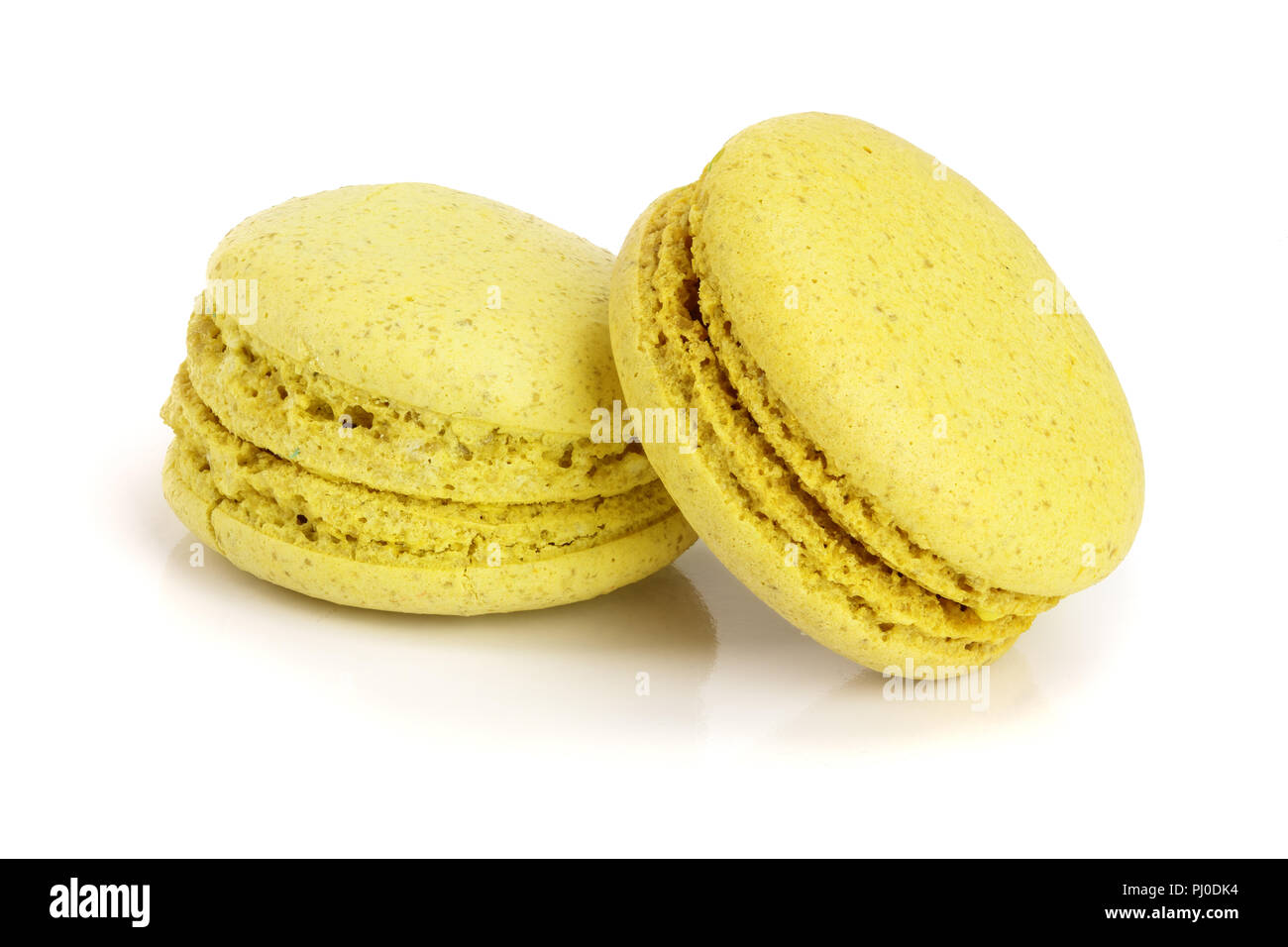 yellow macaroon isolated on white background closeup Stock Photo - Alamy