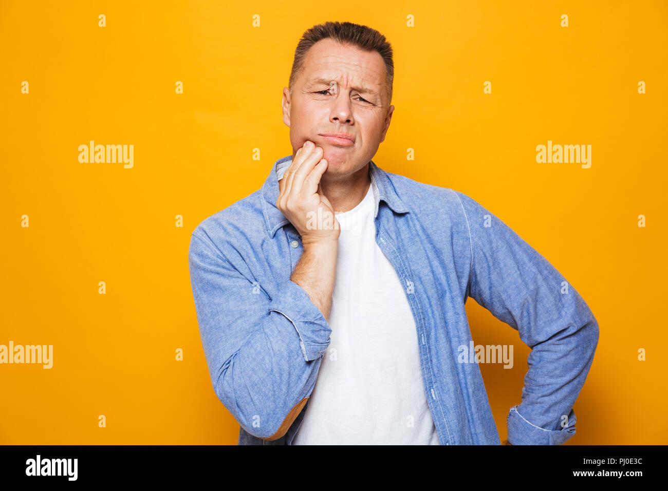Wince pain hi-res stock photography and images - Alamy