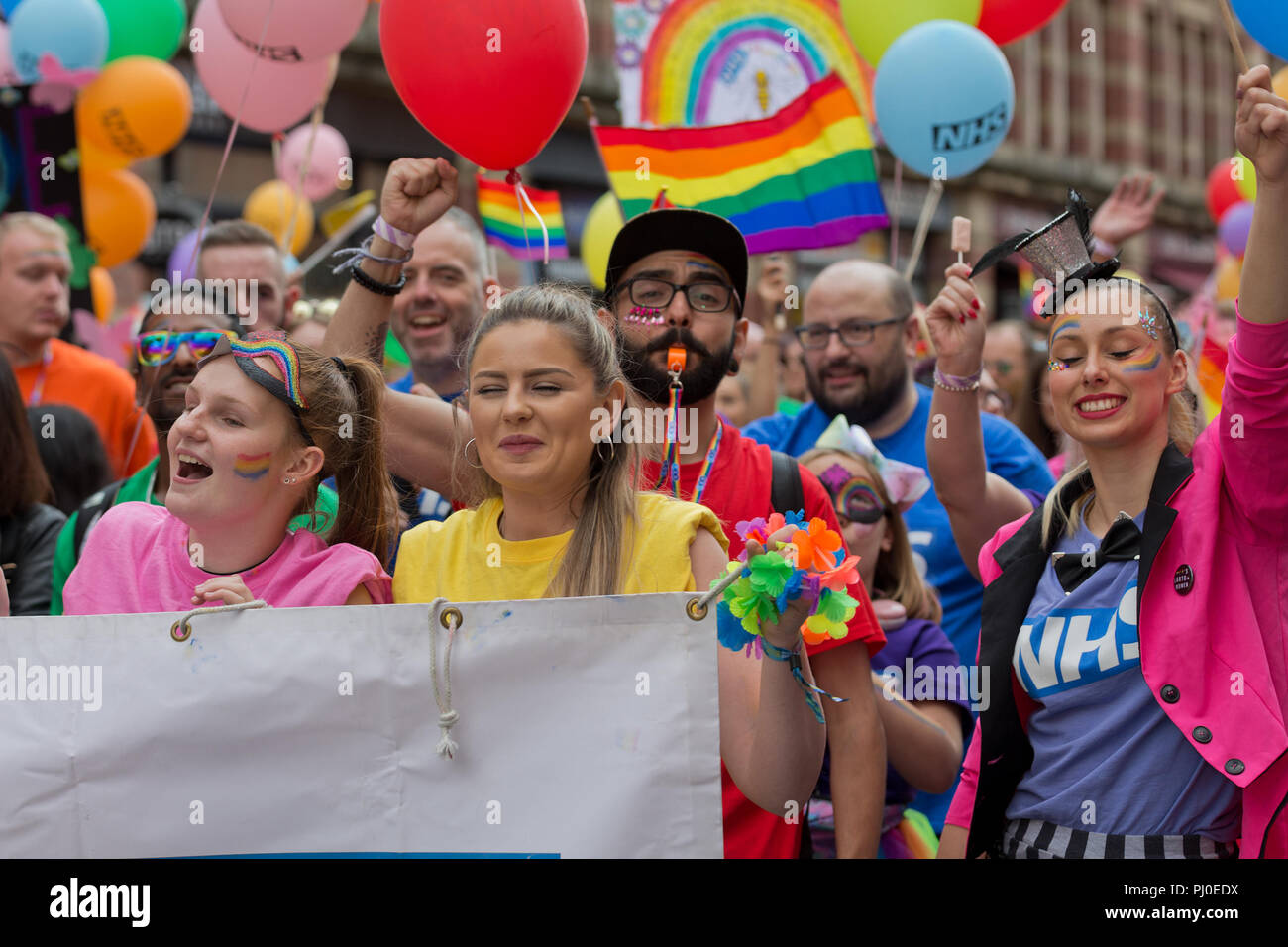 NHS supporters taking part in the 2018 Manchester Pride Parade Stock ...