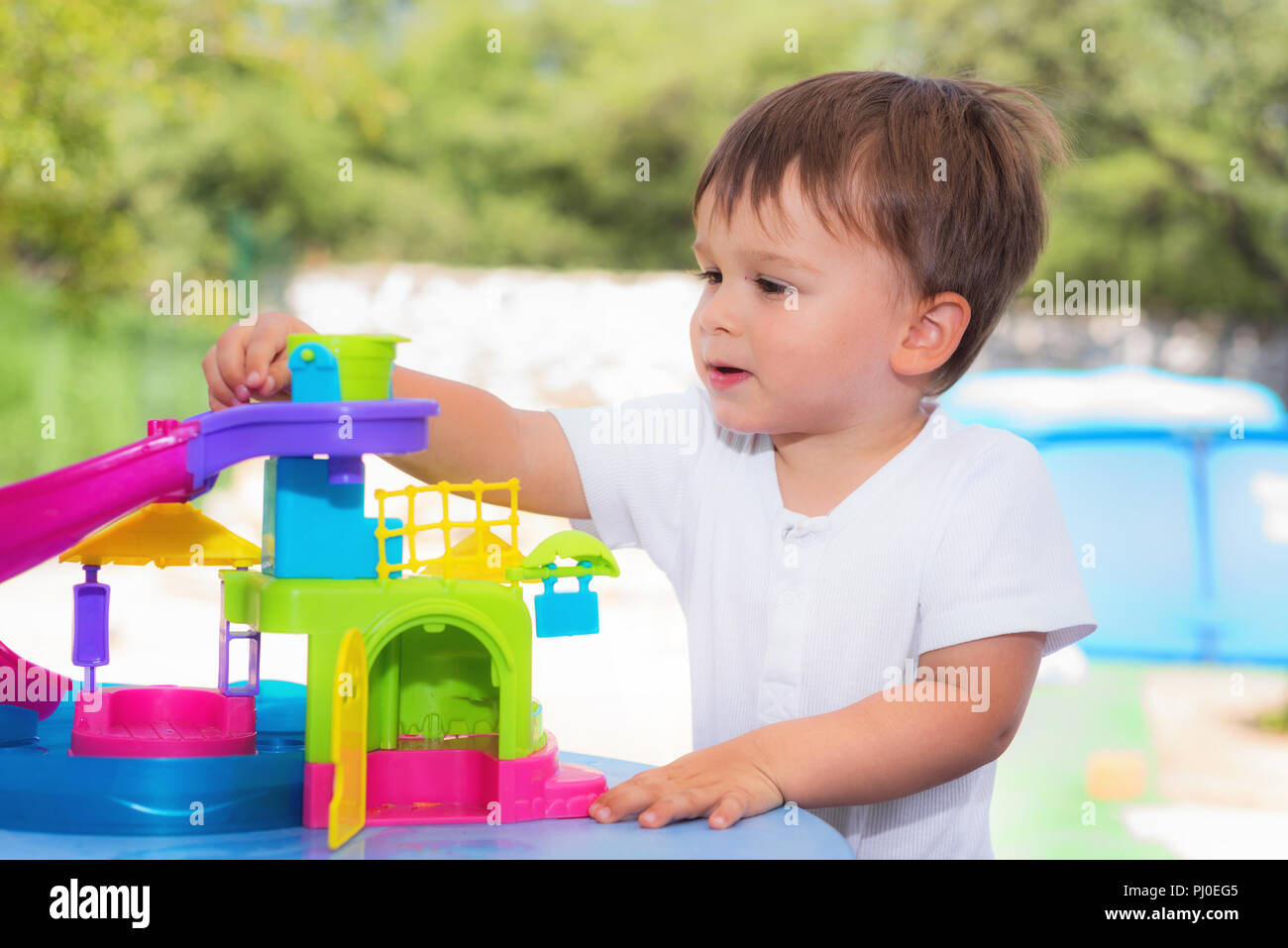 Cheerful baby playing outdoor Stock Photo - Alamy
