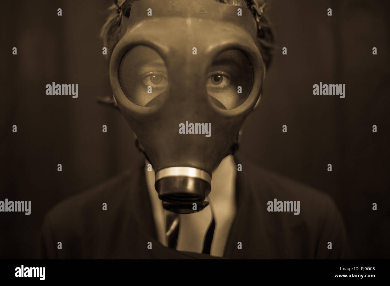 Woman gas mask fear hi-res stock photography and images - Alamy