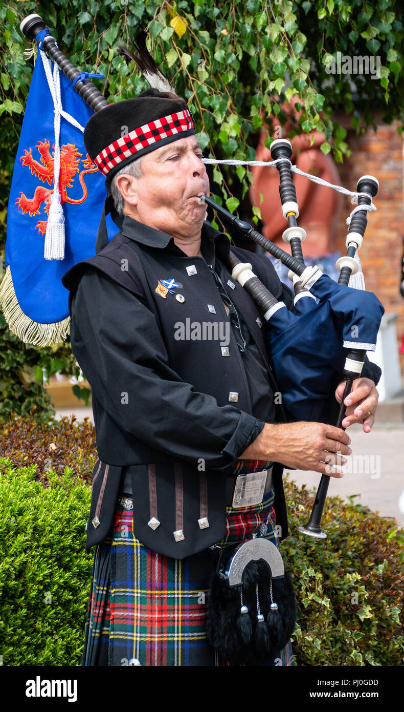 Gretna Green, United Kingdom - August 08 2018: A bagpiper in ...