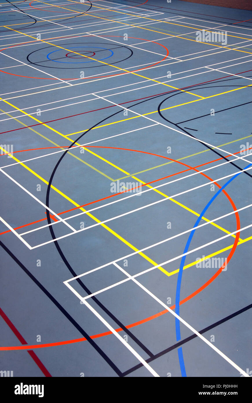 Confusing lines on the floor of an indoor sports hall Stock Photo - Alamy