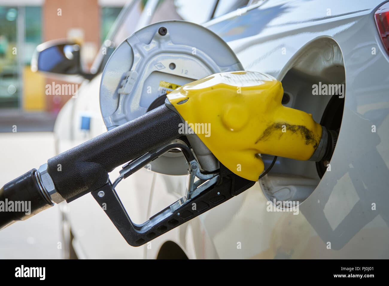 Gas station gun in hi-res stock photography and images - Alamy