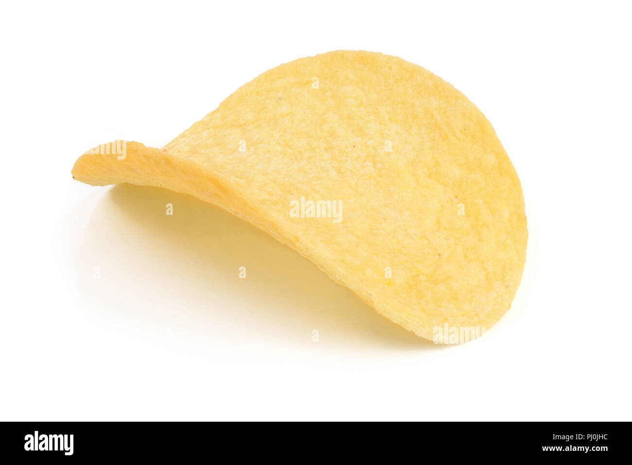 Single potato chip on white background close-up Stock Photo - Alamy