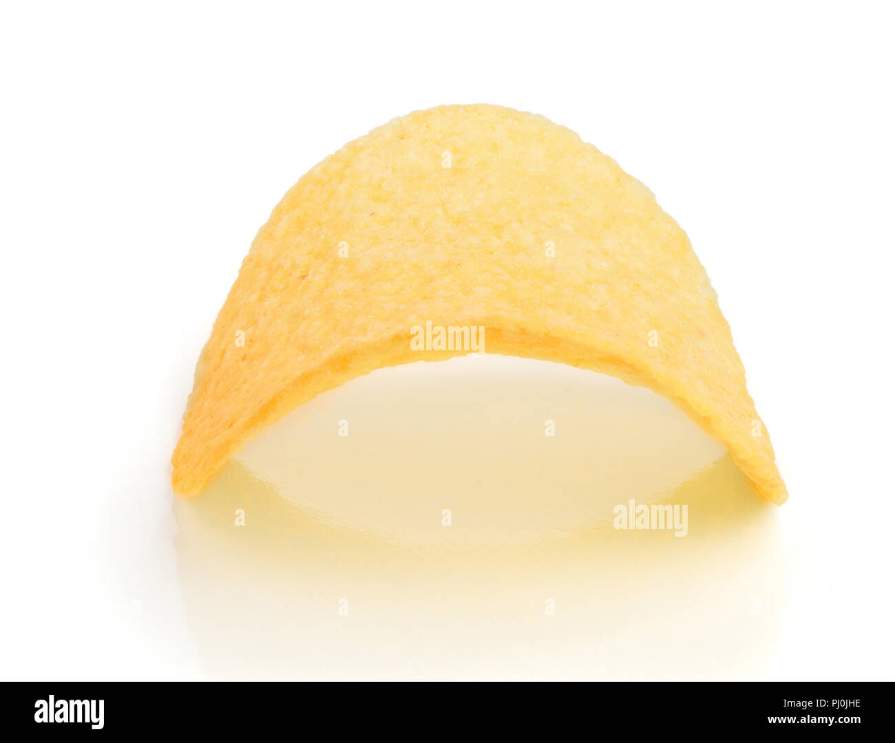 Single potato chip on white background close-up Stock Photo - Alamy