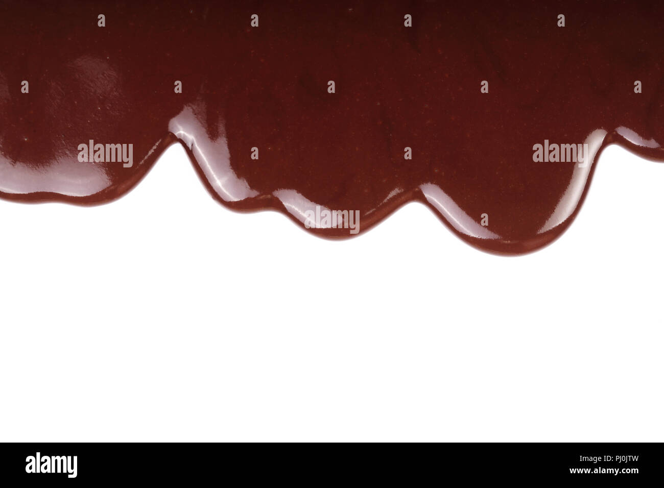 Melted chocolate dripping isolated on white background Stock Photo - Alamy