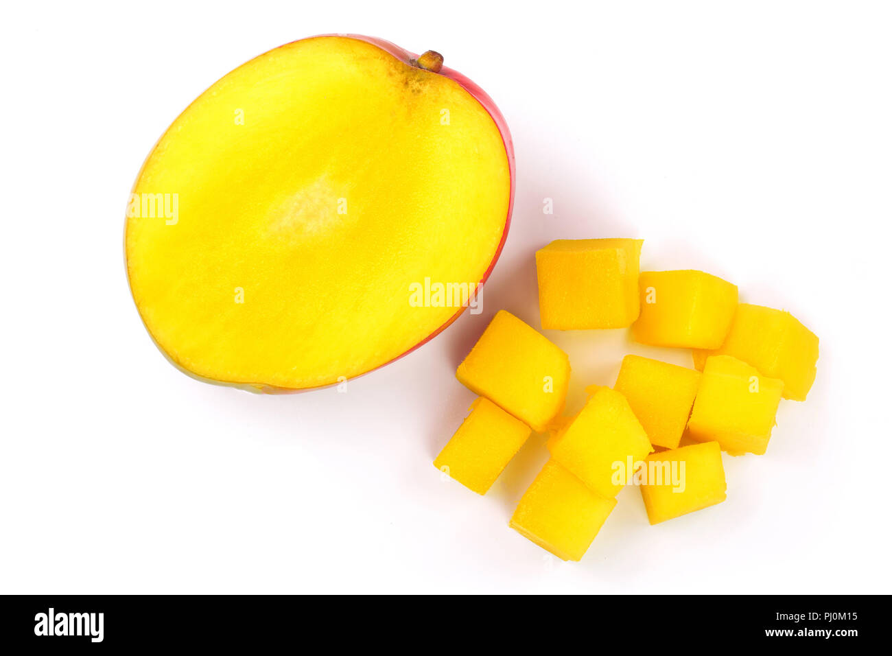 half of Mango fruit isolated on white background close-up. Top view ...