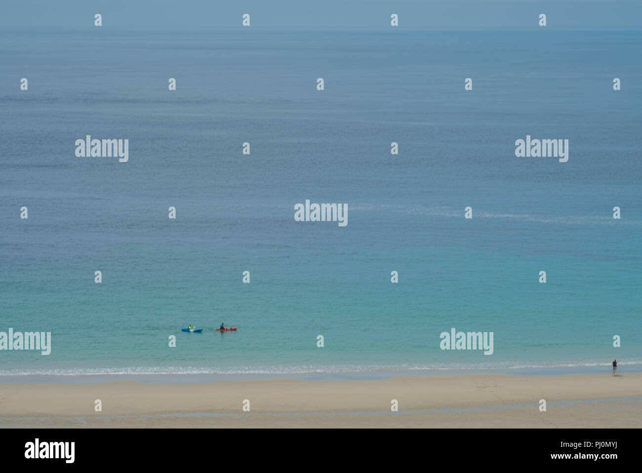Penwith Heritage Coast, England - May 2018 : People rowing in kayaks in ...