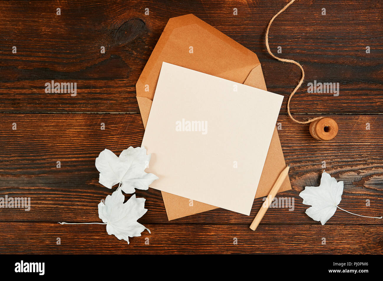 Empty kraft sheet of paper with pensil flat lay mockup for your art ...