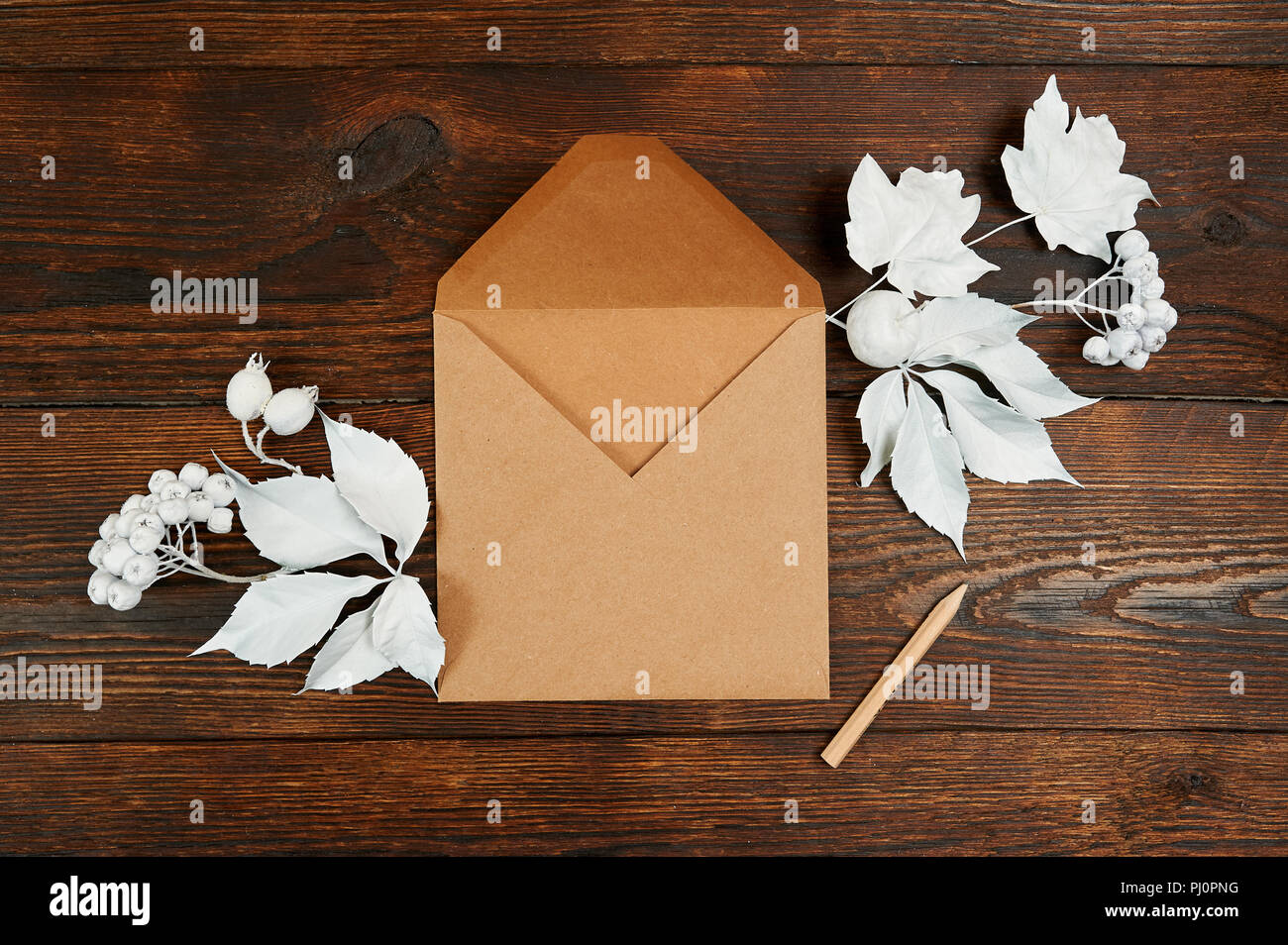Empty kraft sheet of paper with pensil flat lay mockup for your art ...