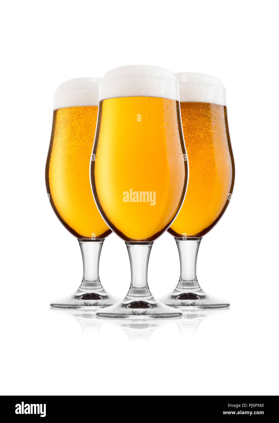 Cold elegant glasses of lager beer with foam and dew isolated on white ...
