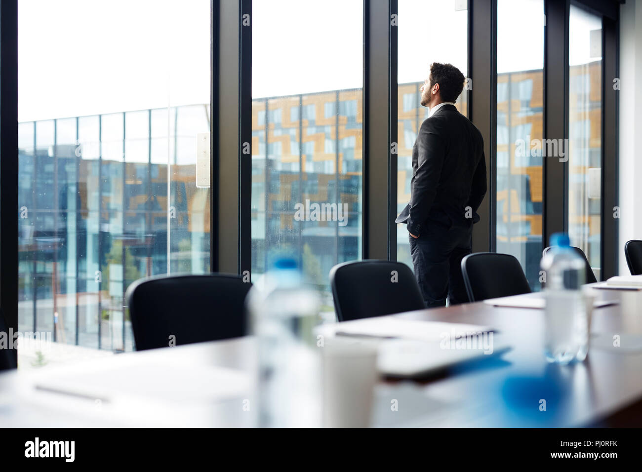 Man waiting room alone window hi-res stock photography and images - Alamy