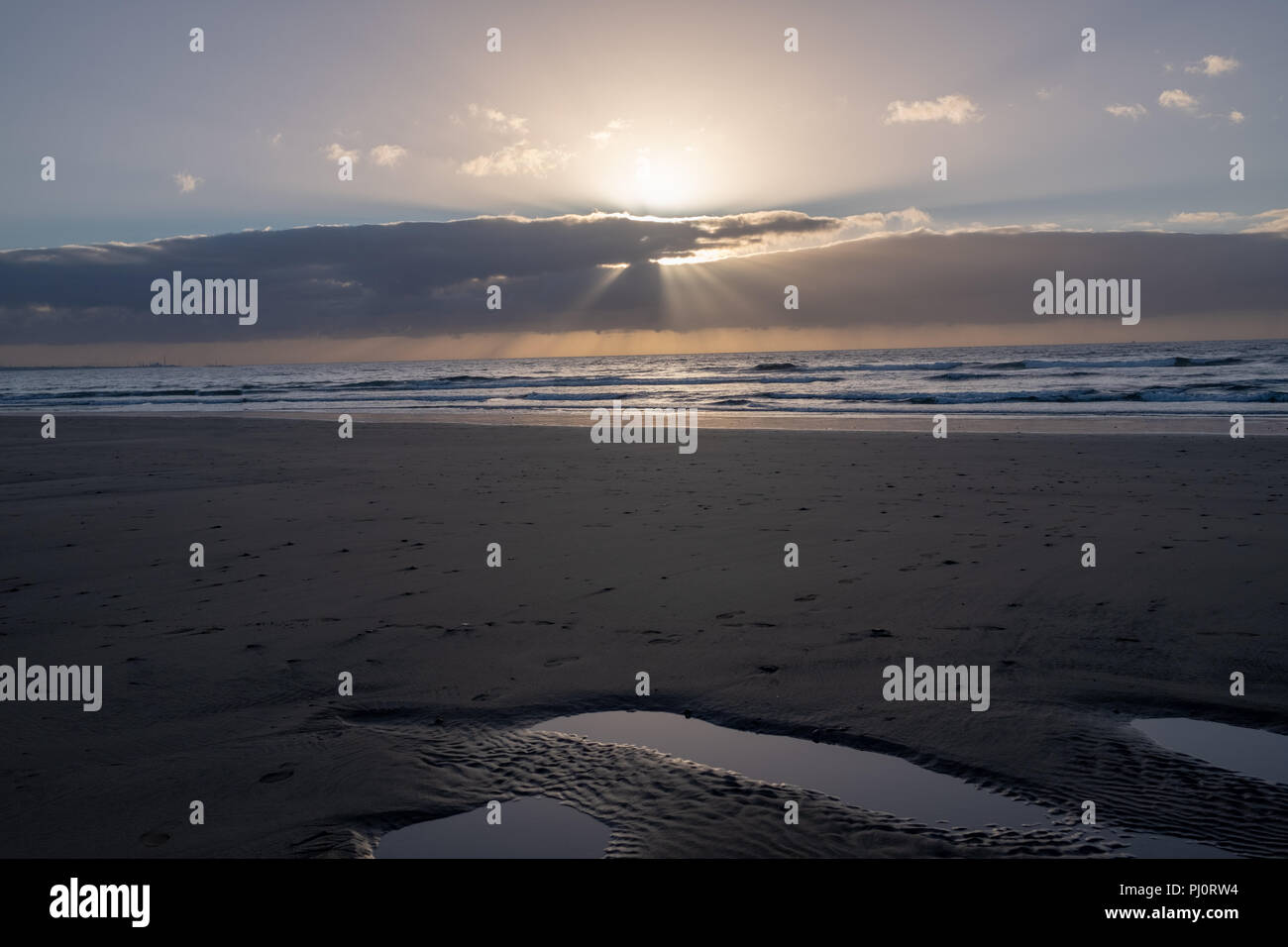 Sunrays at the Beach Stock Photo - Alamy