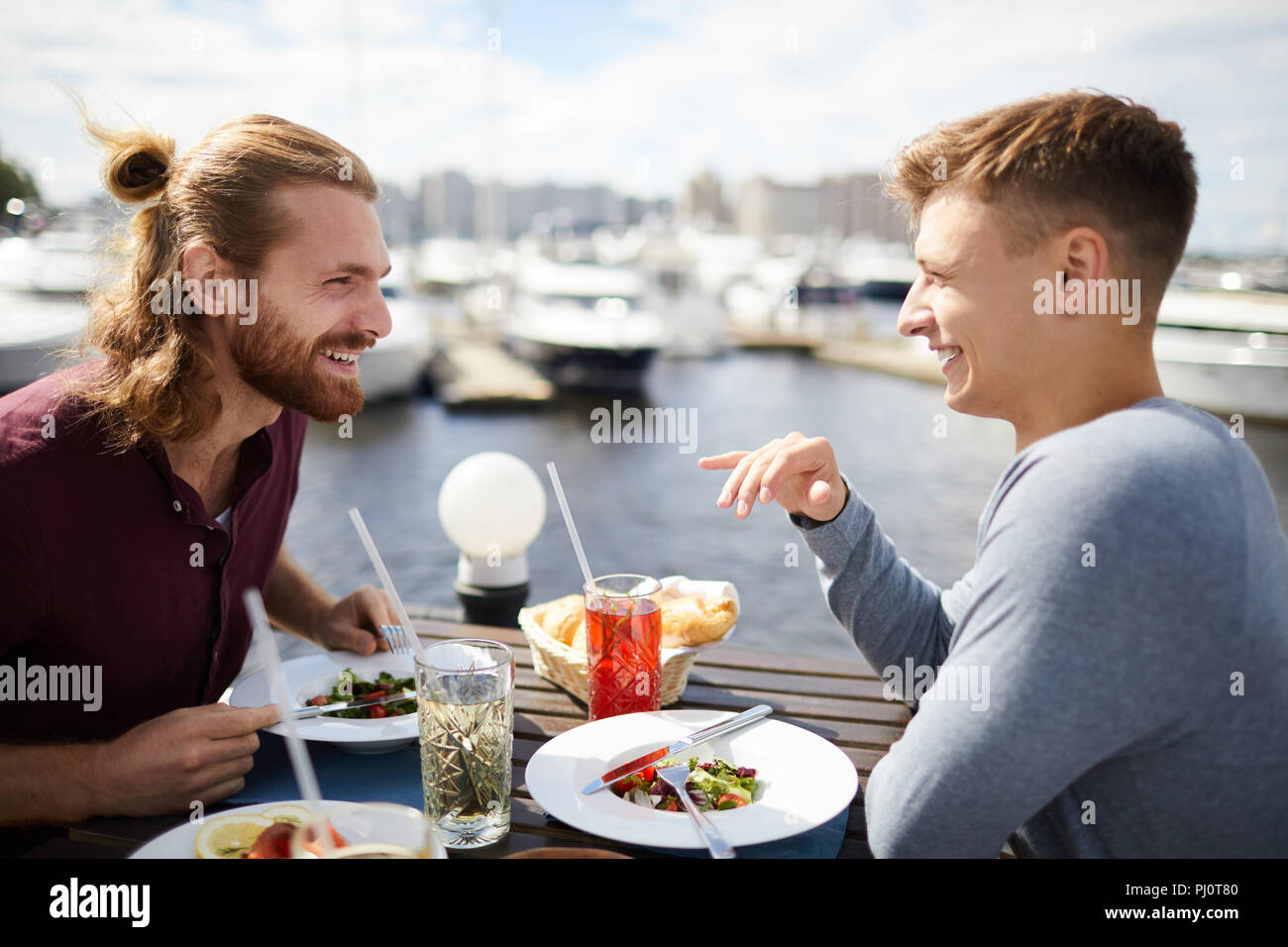 Guys in cafe Stock Photo - Alamy