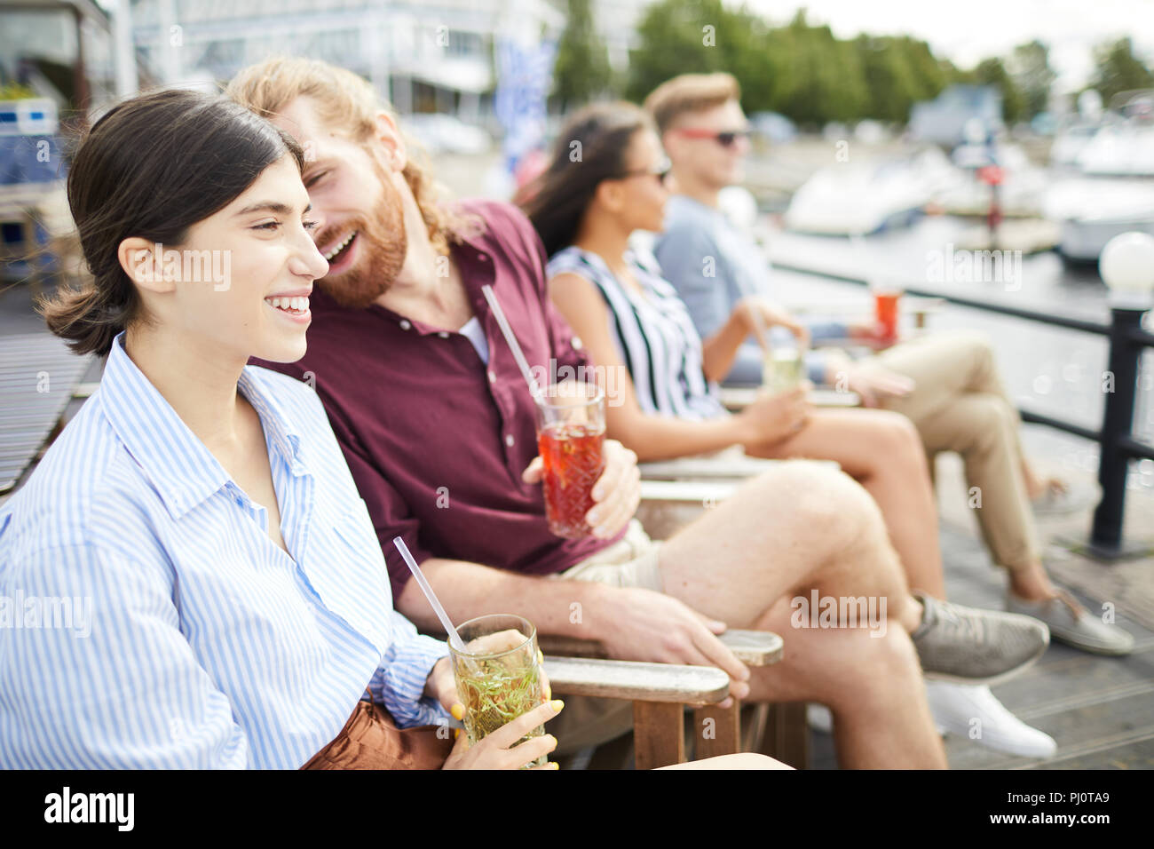 Whispering on ear Stock Photo - Alamy