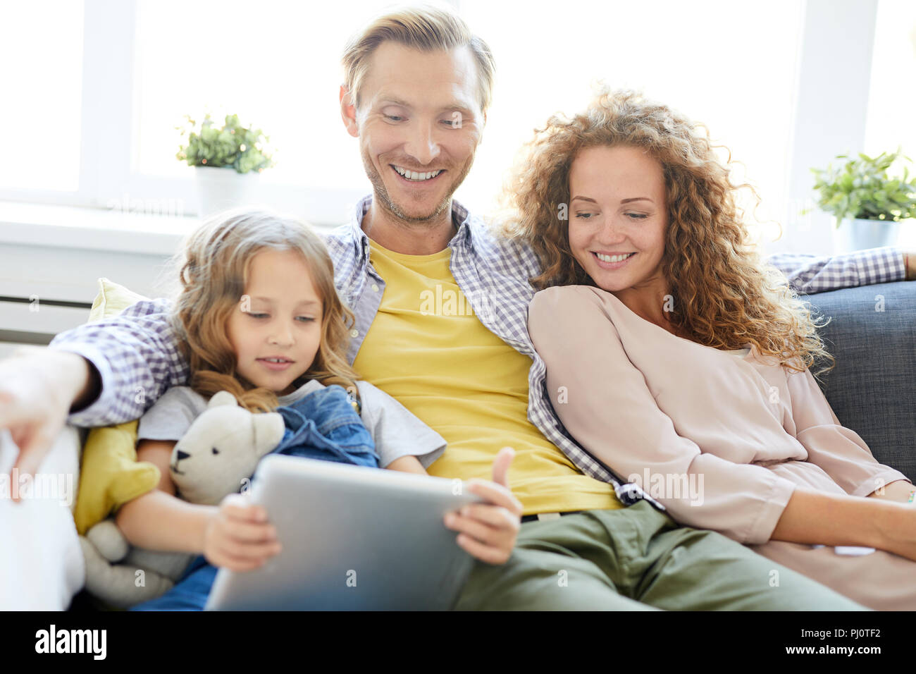 Man woman couple watching girl daughter hi-res stock photography and ...