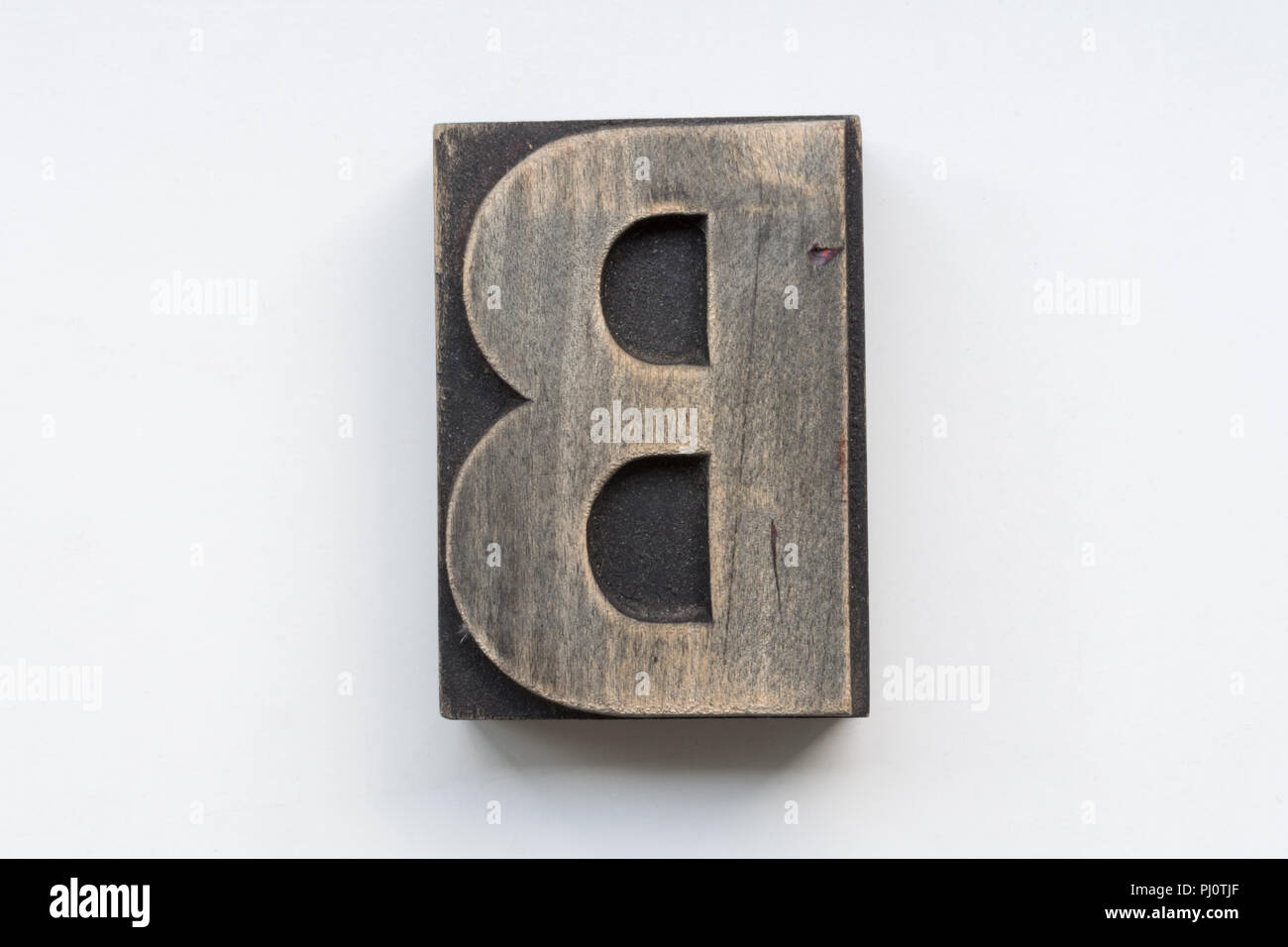 Letterpress letter B printing block isolated on a white background ...
