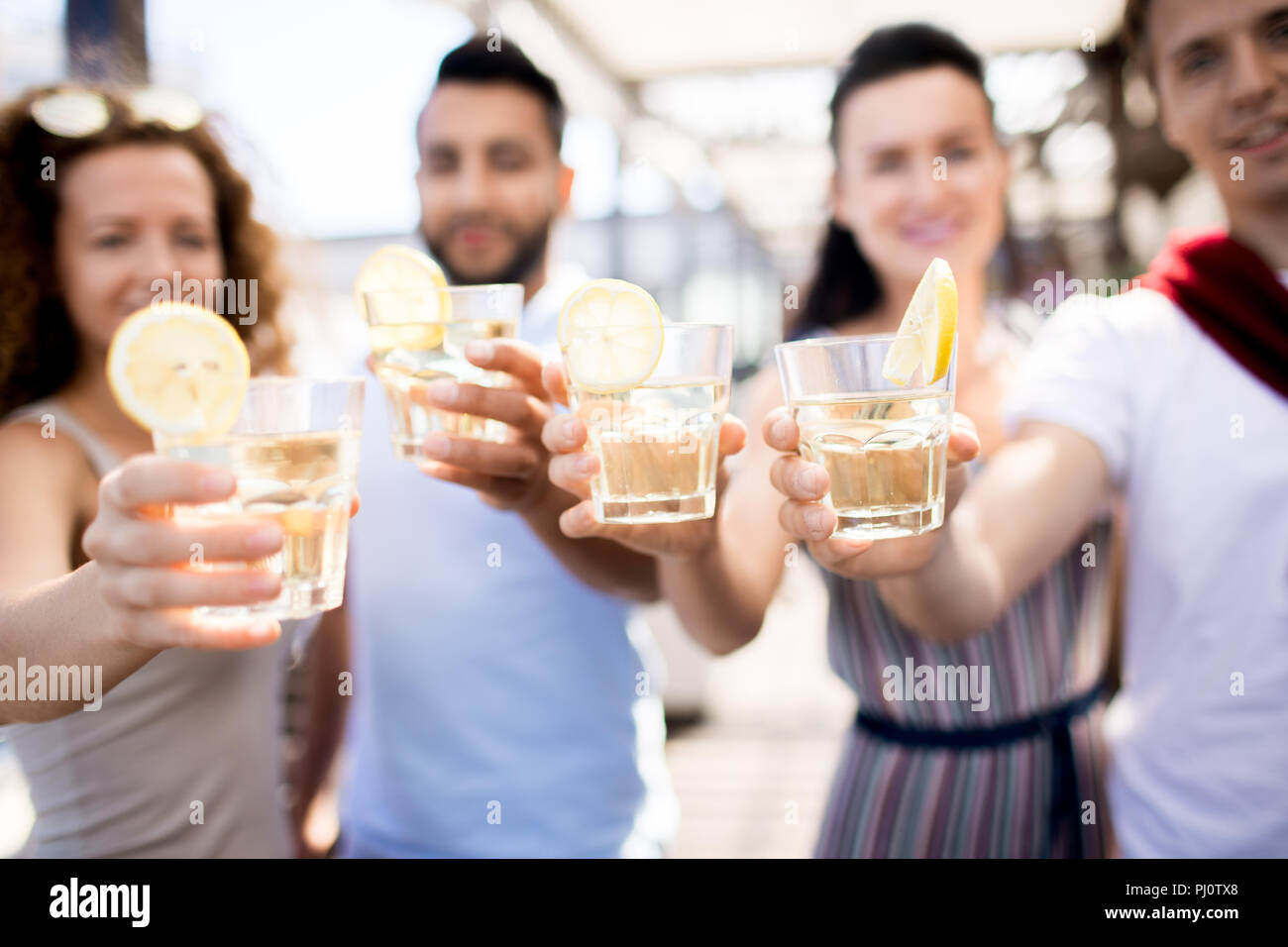 Young friends drink lemonade hi-res stock photography and images - Alamy