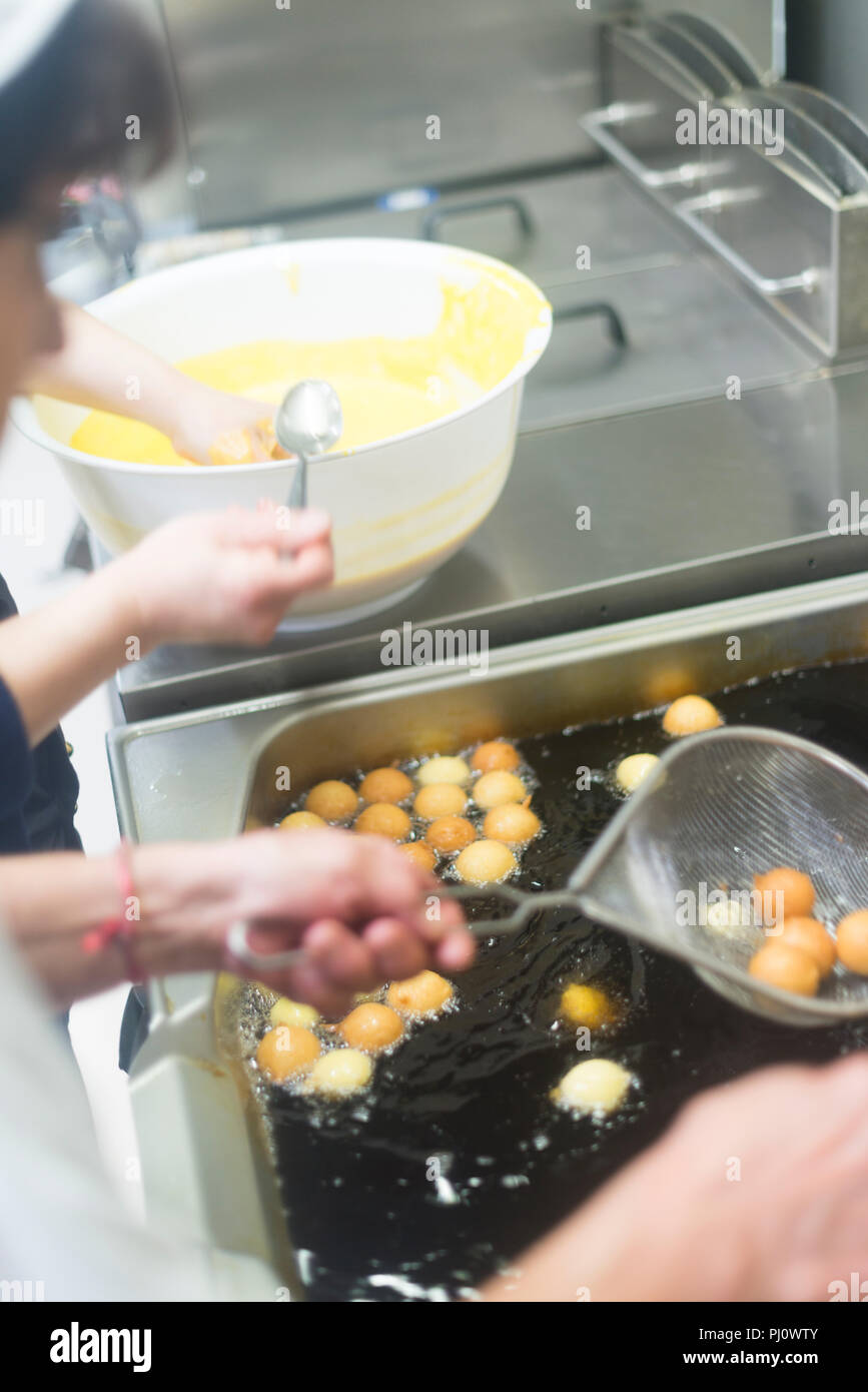 Making sweets fried and baked in the bakery Stock Photo - Alamy