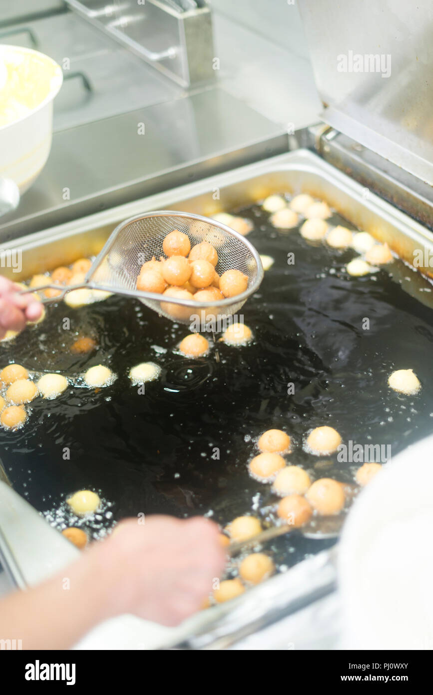 Making sweets fried and baked in the bakery Stock Photo - Alamy