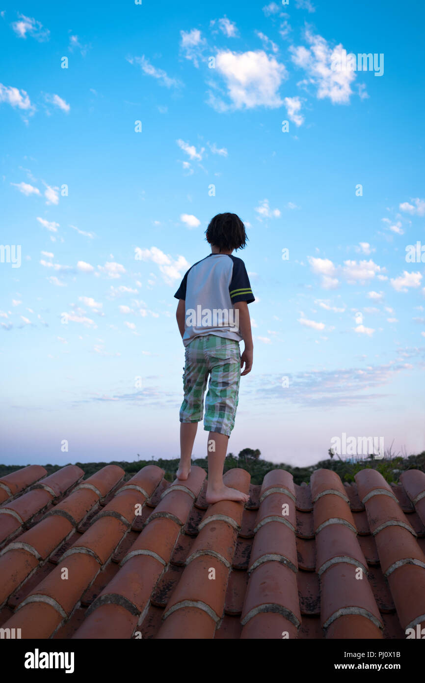 Boy On Roof