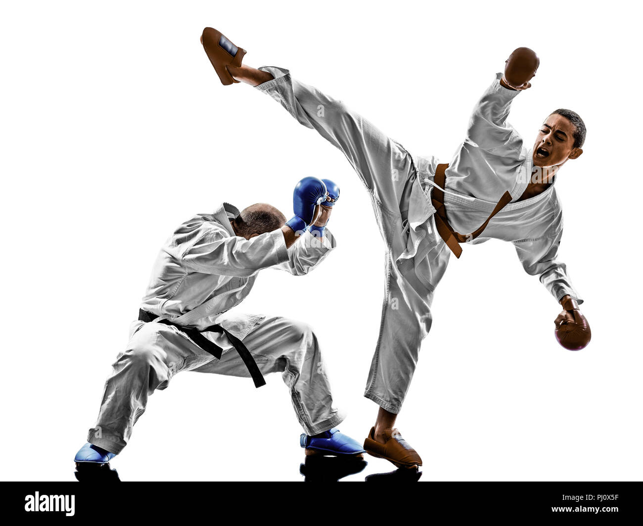 two karate men sensei and teenager student fighters fighting ...