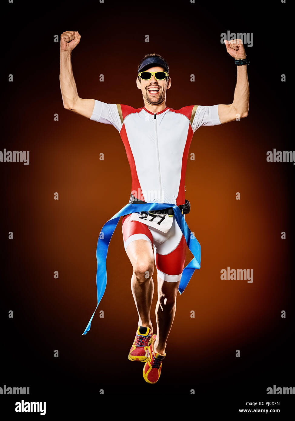 one caucasian man runner running triathlon ironman isolated Stock Photo ...