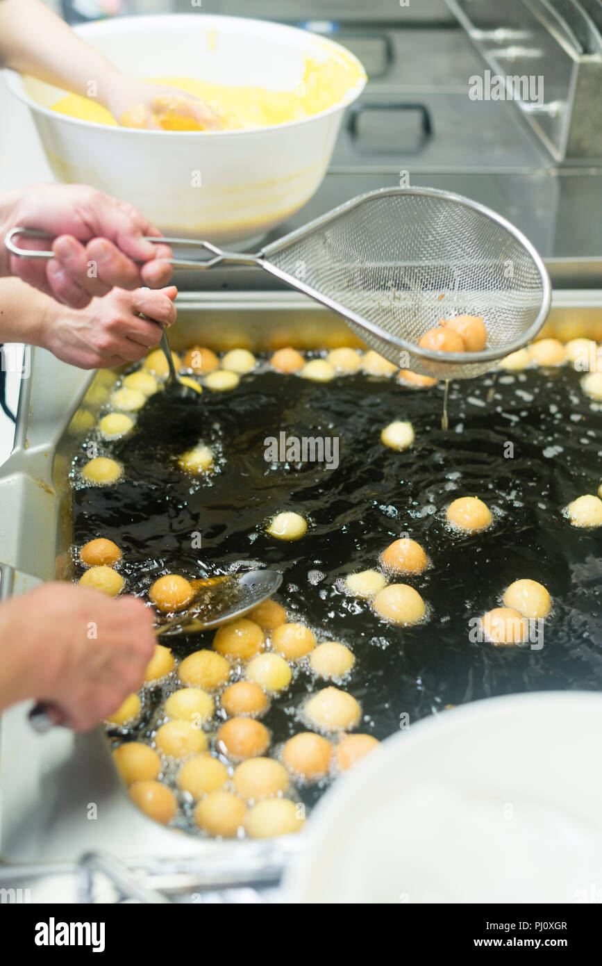 Making sweets fried and baked in the bakery Stock Photo - Alamy
