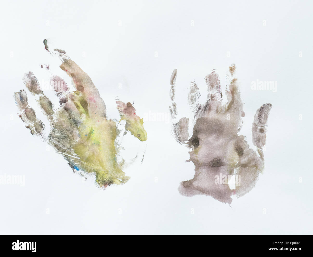 Two Hand color in white paper background Stock Photo - Alamy