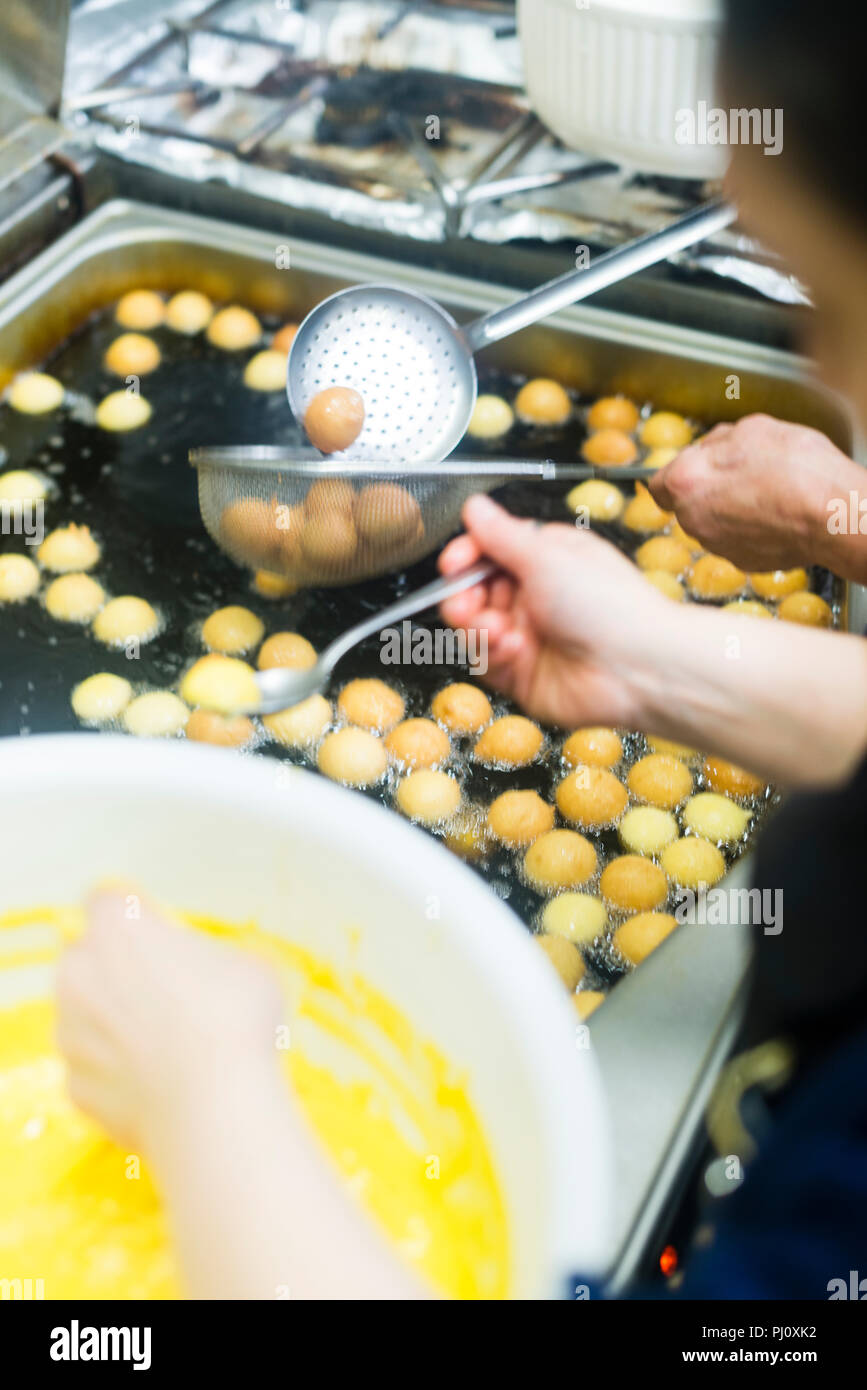 Making sweets fried and baked in the bakery Stock Photo - Alamy