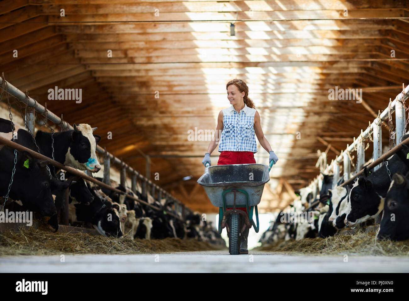 Happy Female Farmer Stock Photo - Alamy