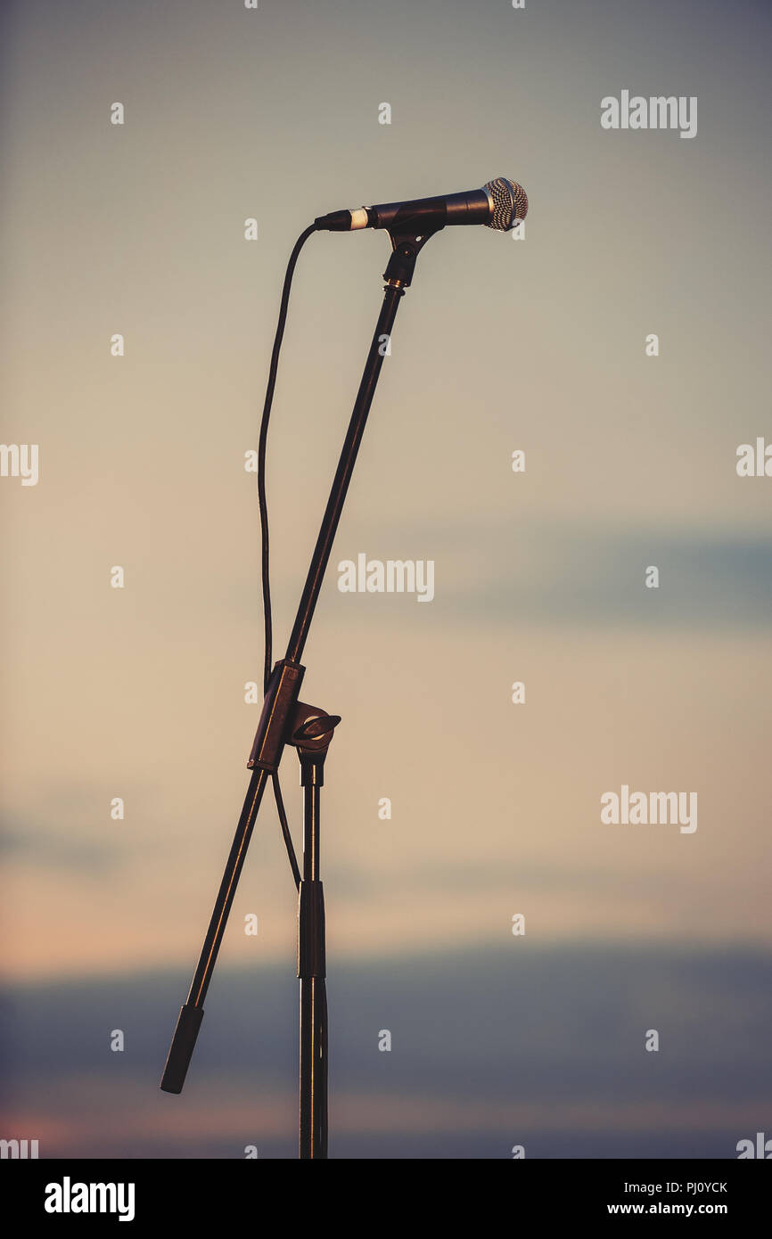 Vocal microphone on stage at outdoor summer festival Stock Photo - Alamy