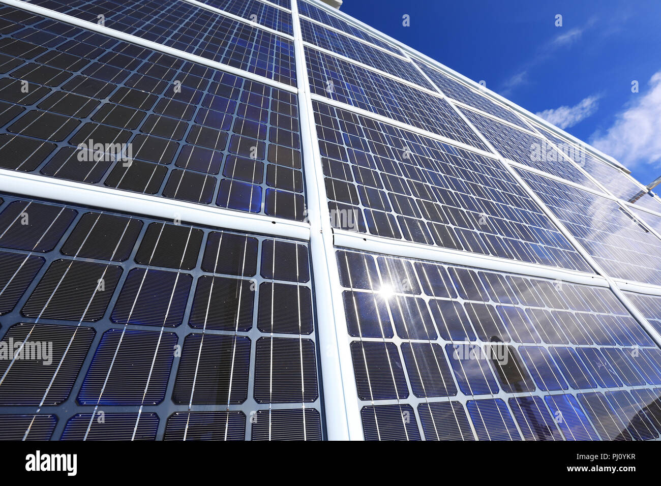 Rooftop solar electric cell array Stock Photo - Alamy