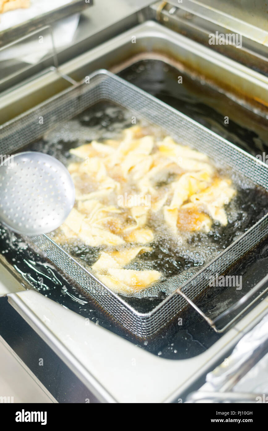 Making sweets fried and baked in the bakery Stock Photo - Alamy