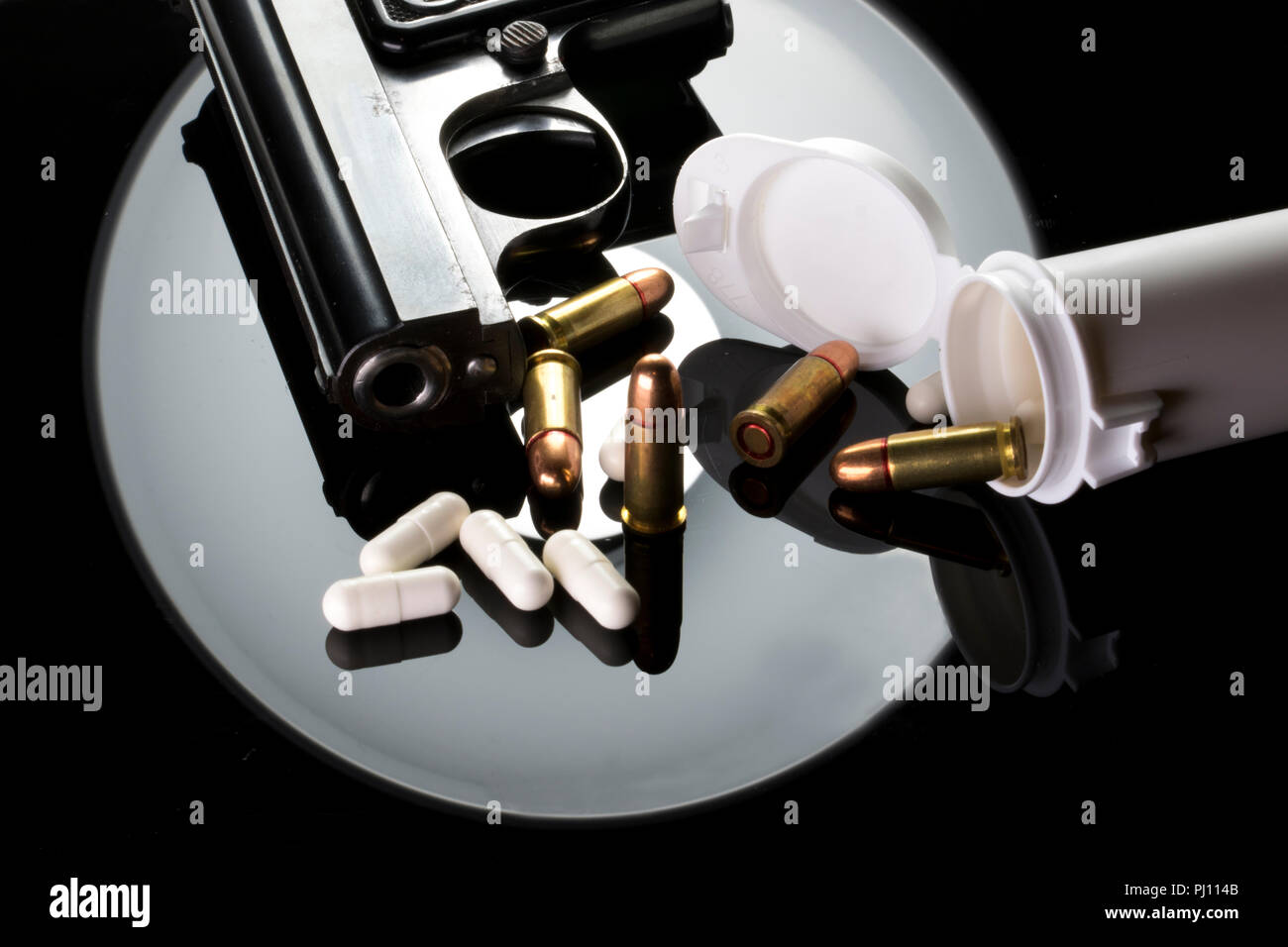 Gun, Bullets, pills and moody lighting. Ammunition and prescription ...
