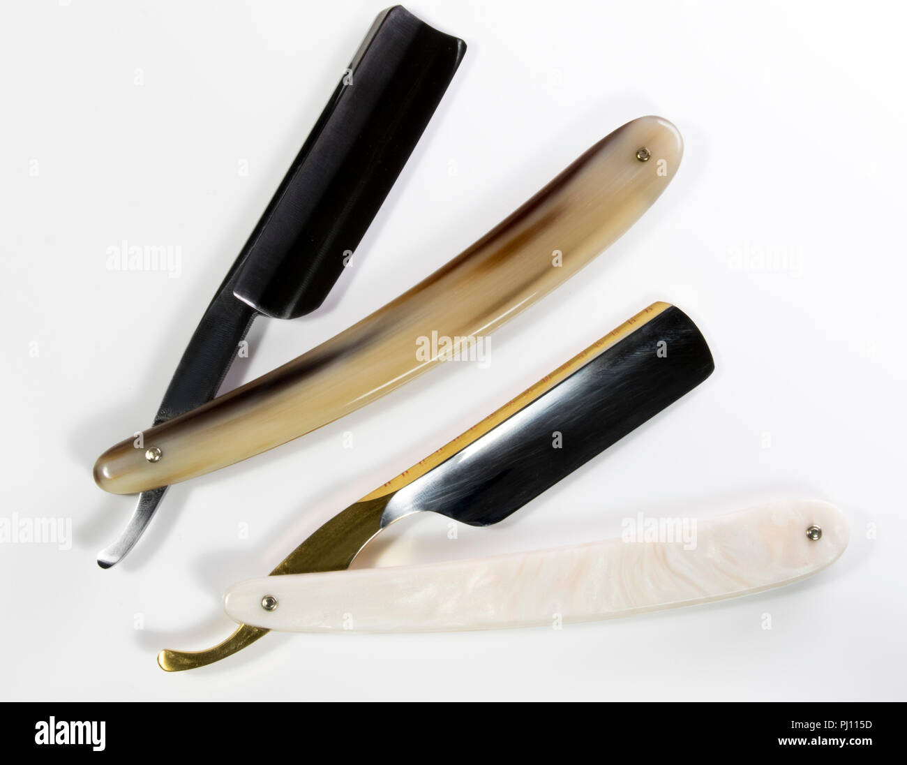 Straight razors isolated on white. Traditional men's grooming razors ...