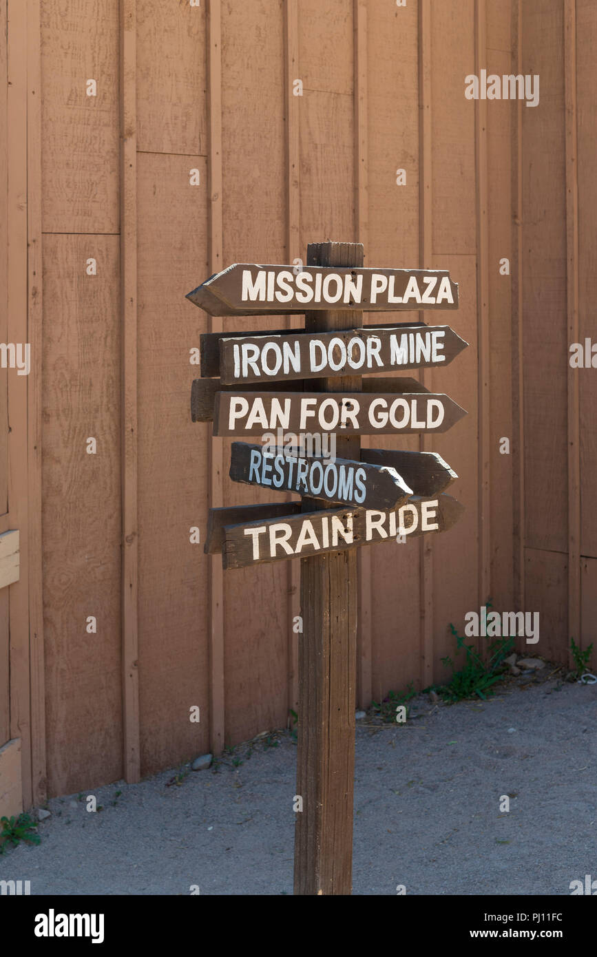 Wood pillar with painted wooden arrow signs hi-res stock photography ...