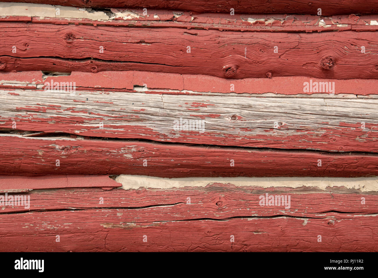 siding of an old red log barn with peeling paint Stock Photo - Alamy