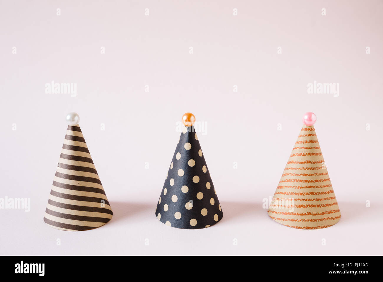 Colorful party cone hat Stock Photo - Alamy