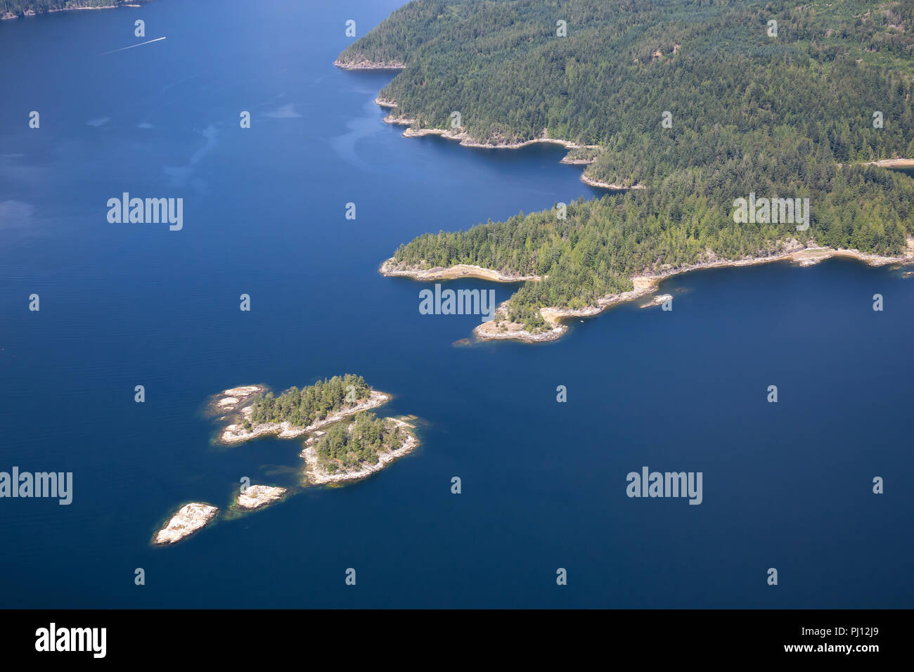 Aerial view of the rocky islands in Sechelt Inlet during a sunny summer ...