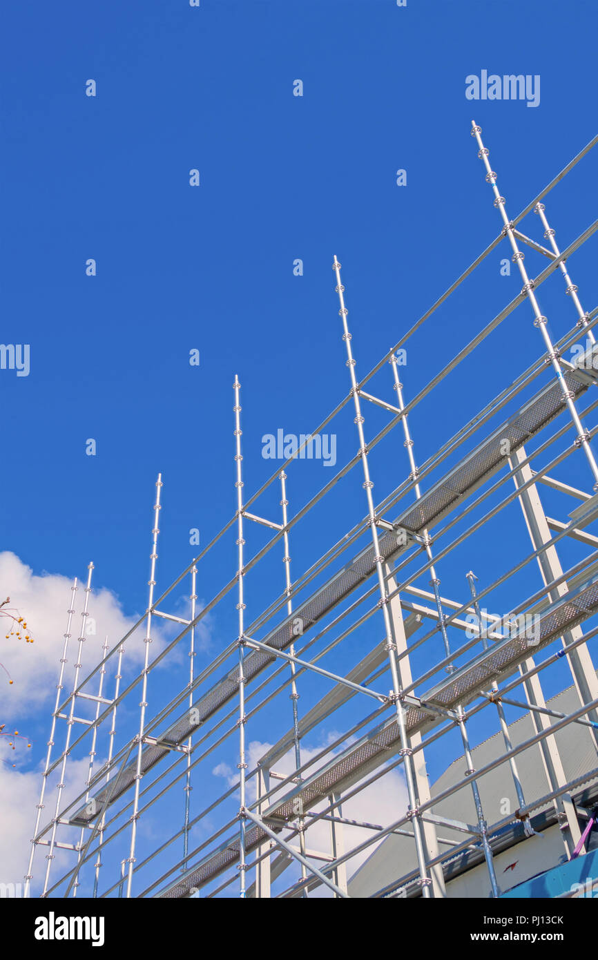 Steel construction scaffolding erected and rising into sky Stock Photo ...