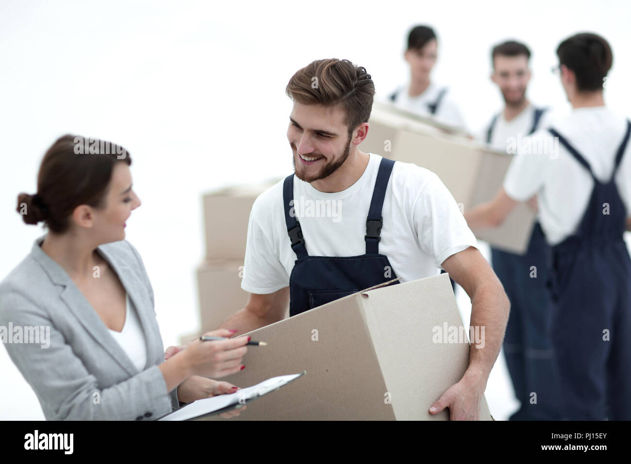 Manager and movers isolated on white background Stock Photo - Alamy