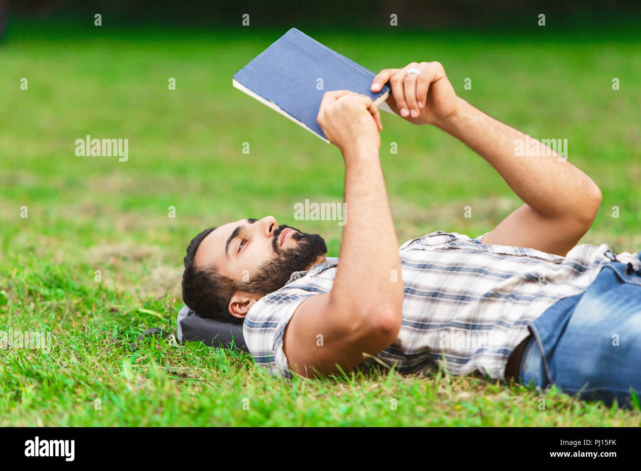 Man laying in meadow hi-res stock photography and images - Alamy