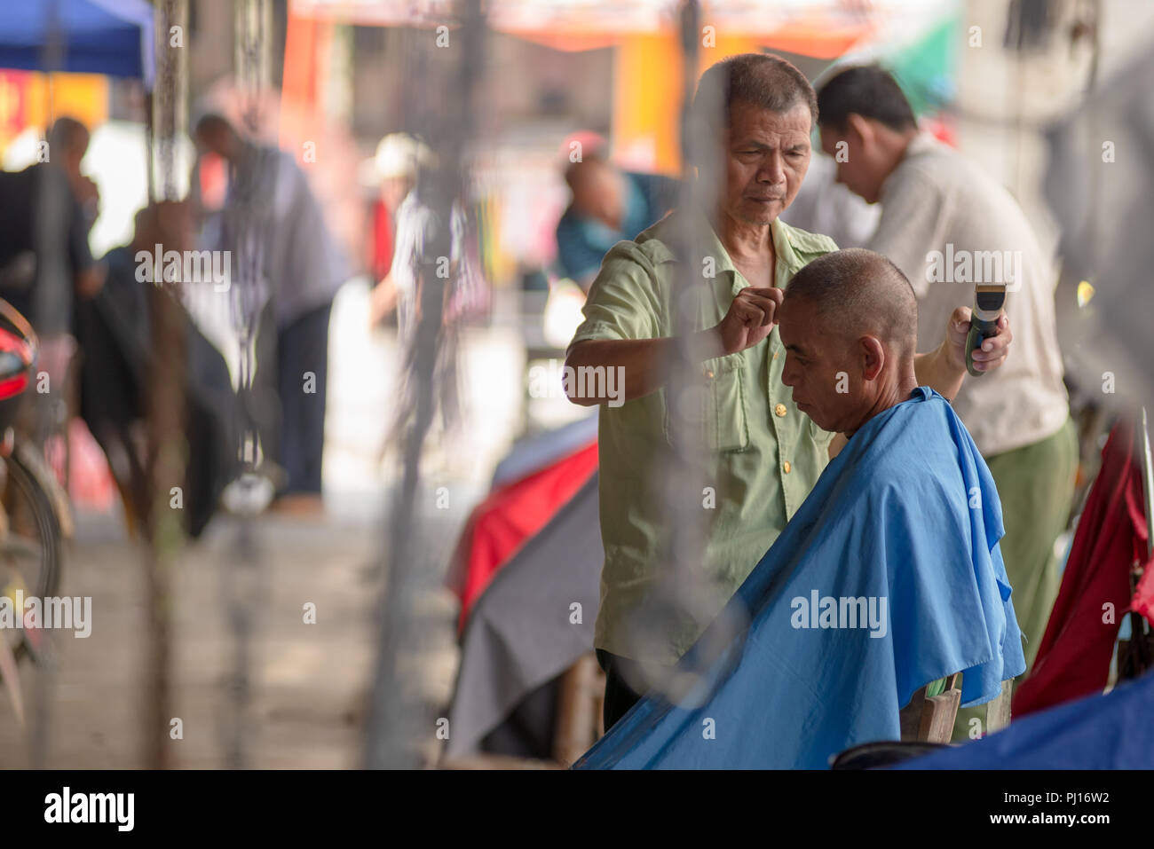 Chinese haircut hi-res stock photography and images - Alamy