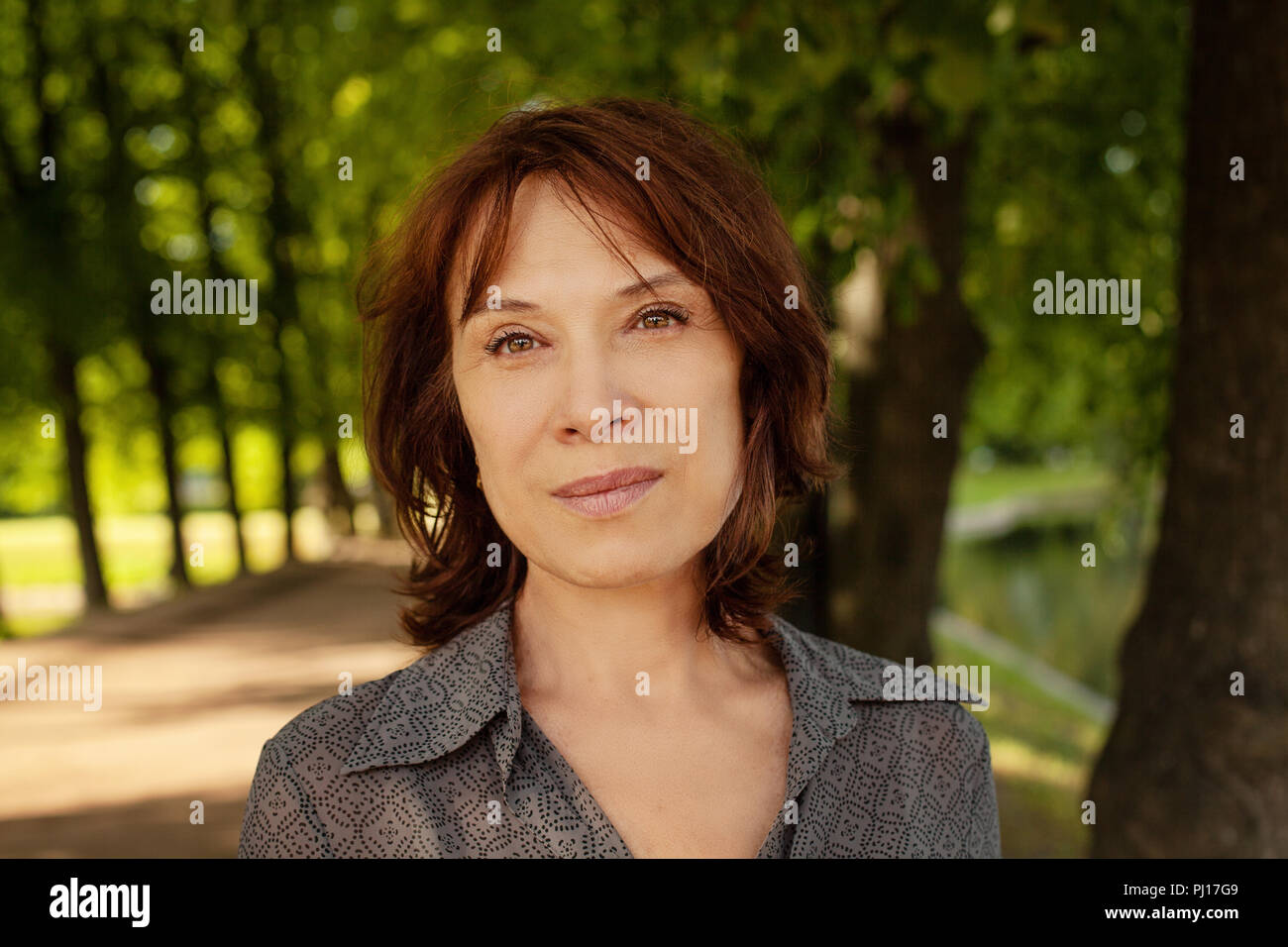 Perfect mature woman face. Mid adult lady outdoors Stock Photo - Alamy
