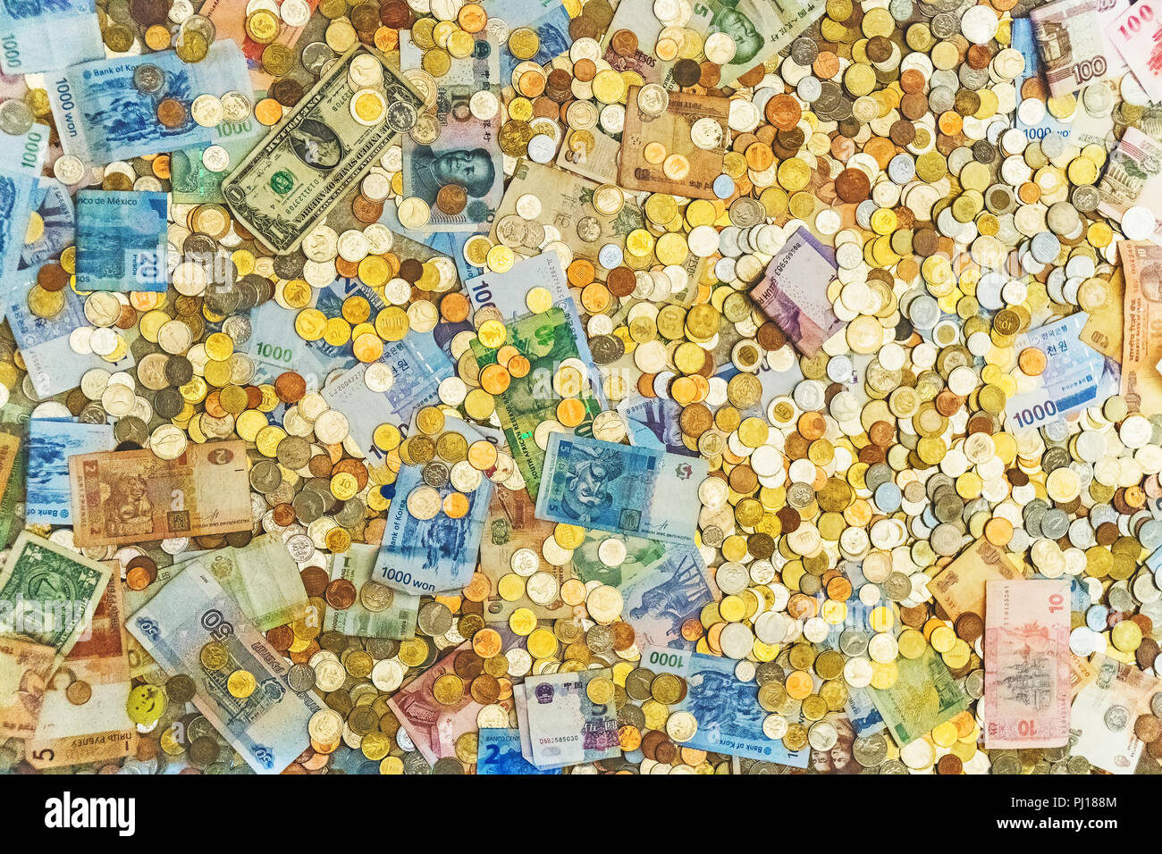 Lots of different money. Banknotes and coins Stock Photo - Alamy